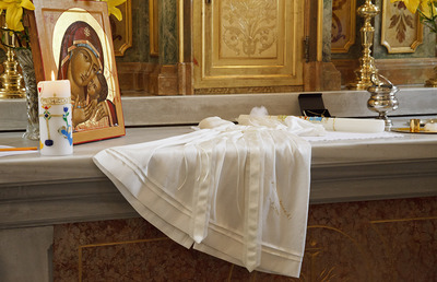 Was sind die Zeichen einer katholischen Tauffeier?